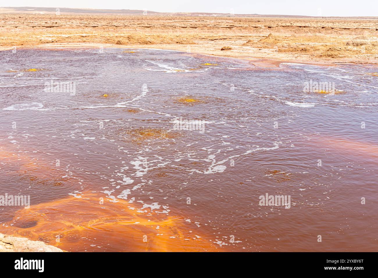 Red boiling Lake in the salt canyon of the Dallol Volcano, Hamadela ...