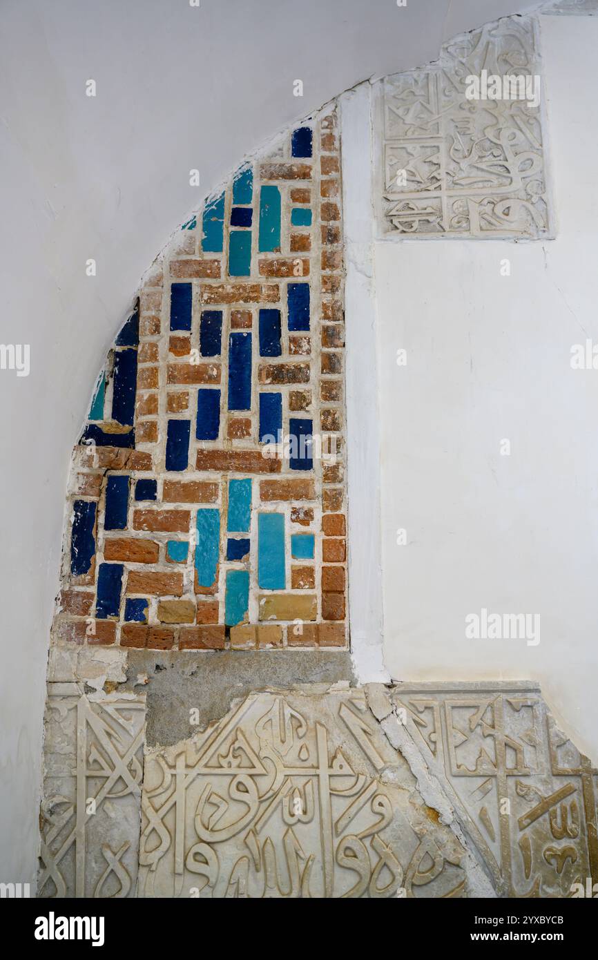 A pattern lined with colored bricks and tiles with ancient Arabic ...