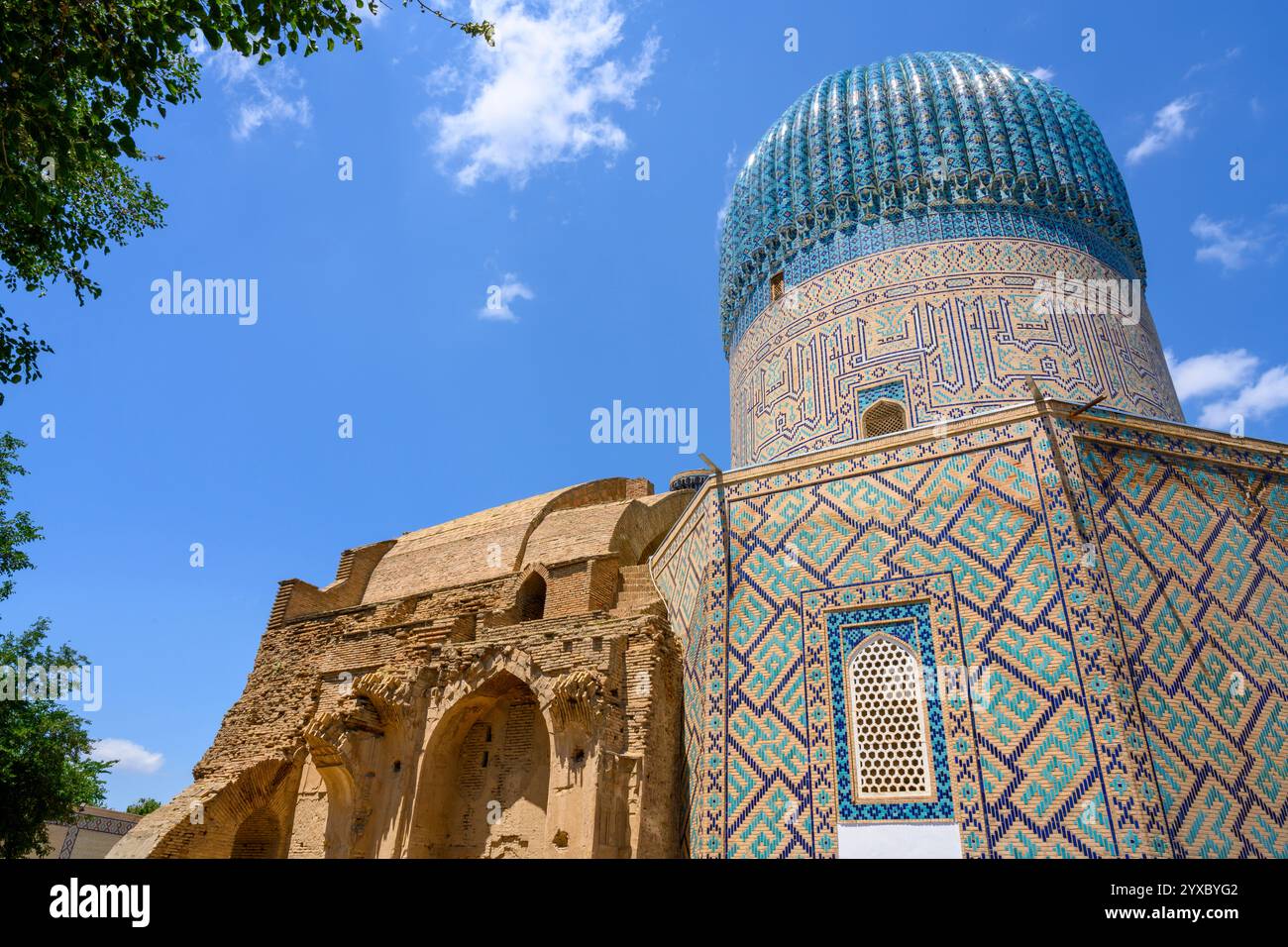 The mosque with a turquoise carved dome with patterns and ancient ...
