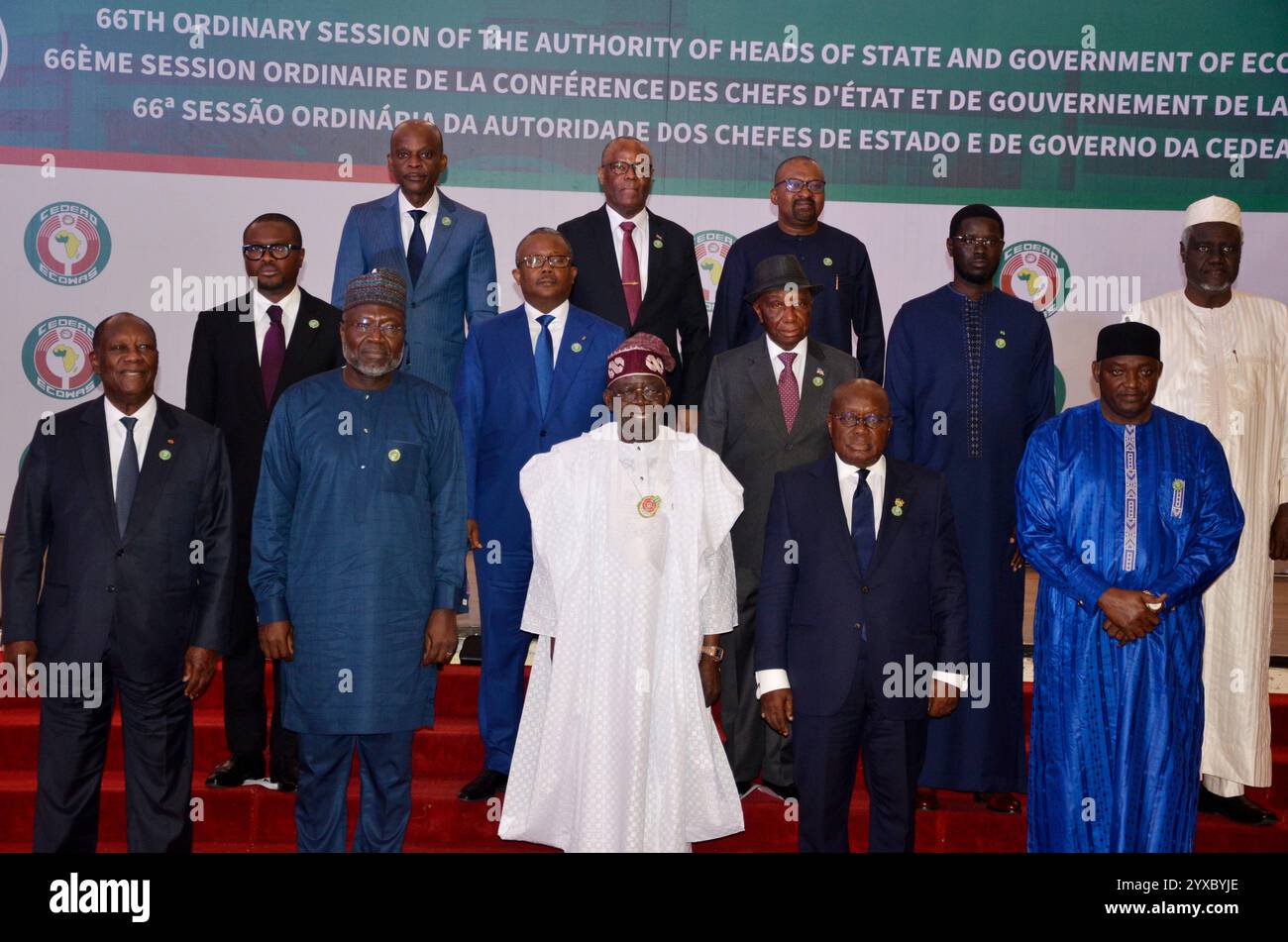 Nigeria's President, Bola Ahmed Tinubu, third from left, first row, poses for a group photo with ...