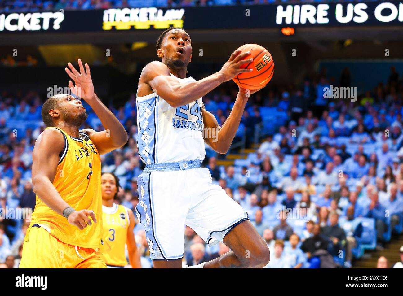 December 14, 2024: North Carolina senior Jae'Lyn Withers (24) goes up ...