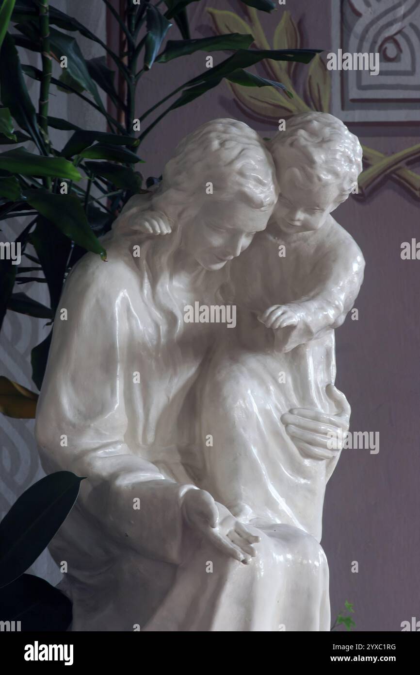 Blessed Virgin Mary with baby Jesus, statue in the church Our Lady of ...