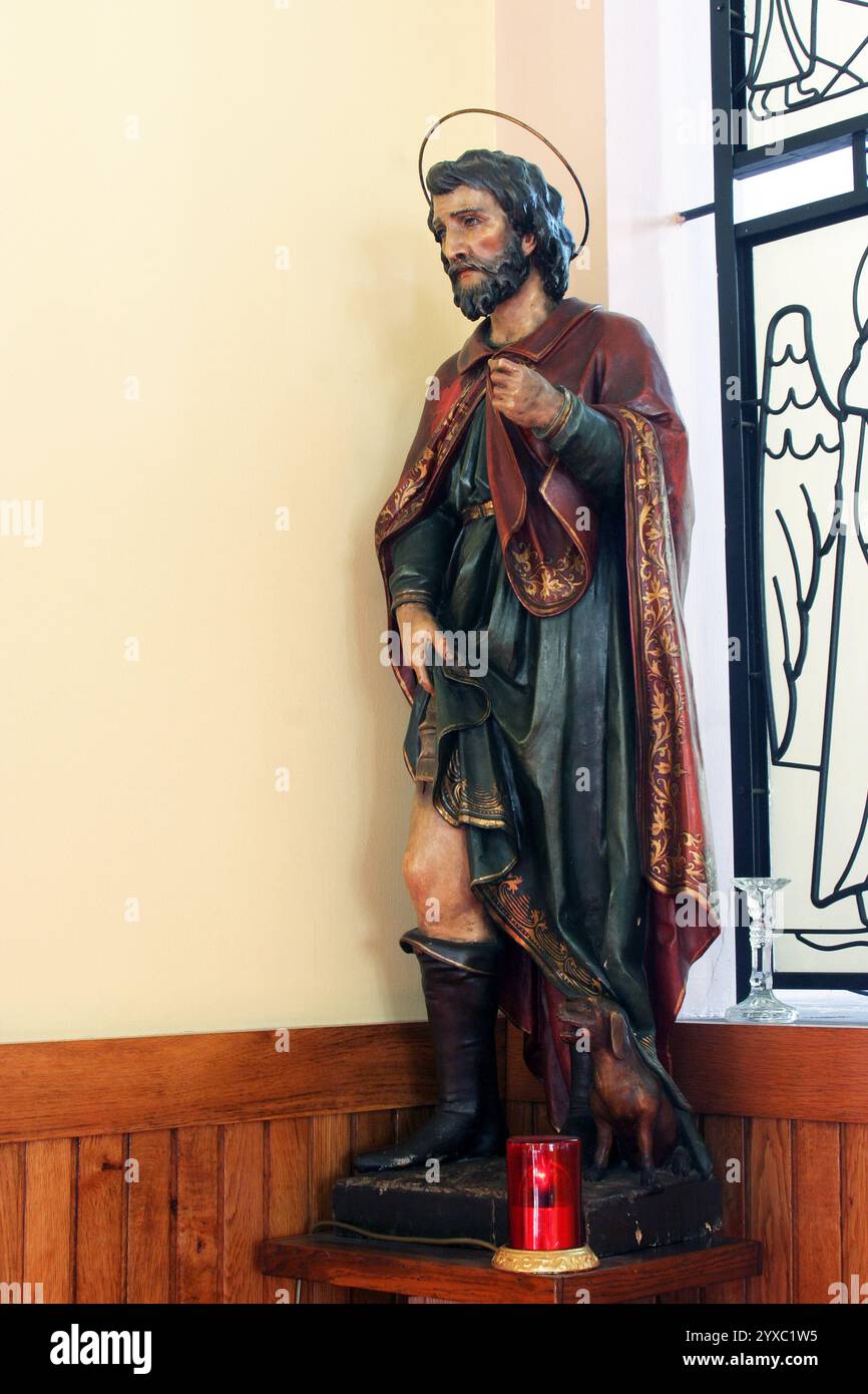 Saint Roch, statue on the main altar in the parish church of the Christ ...