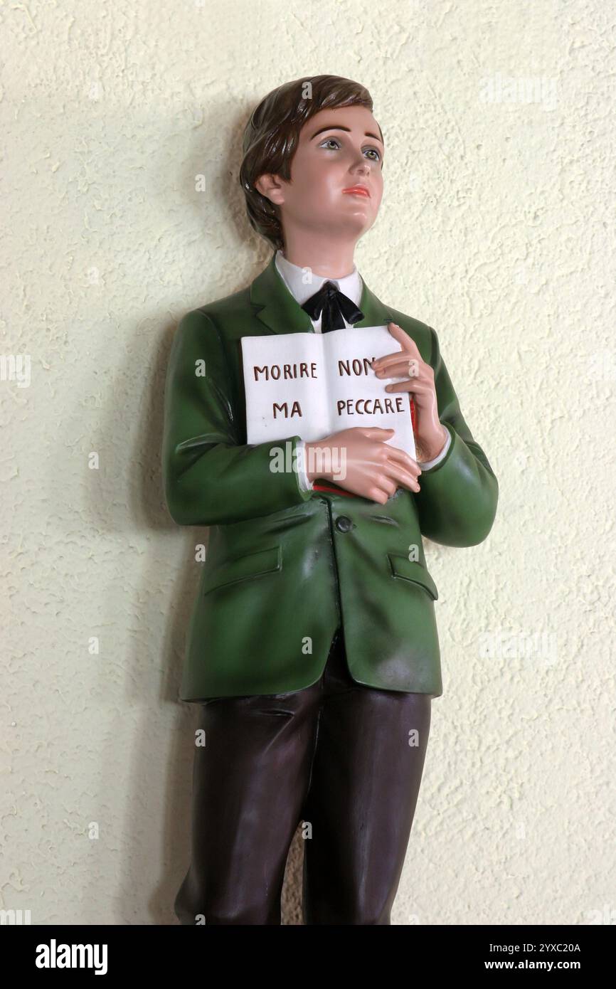 Saint Dominic Savio, statue on the main altar in the parish church of ...