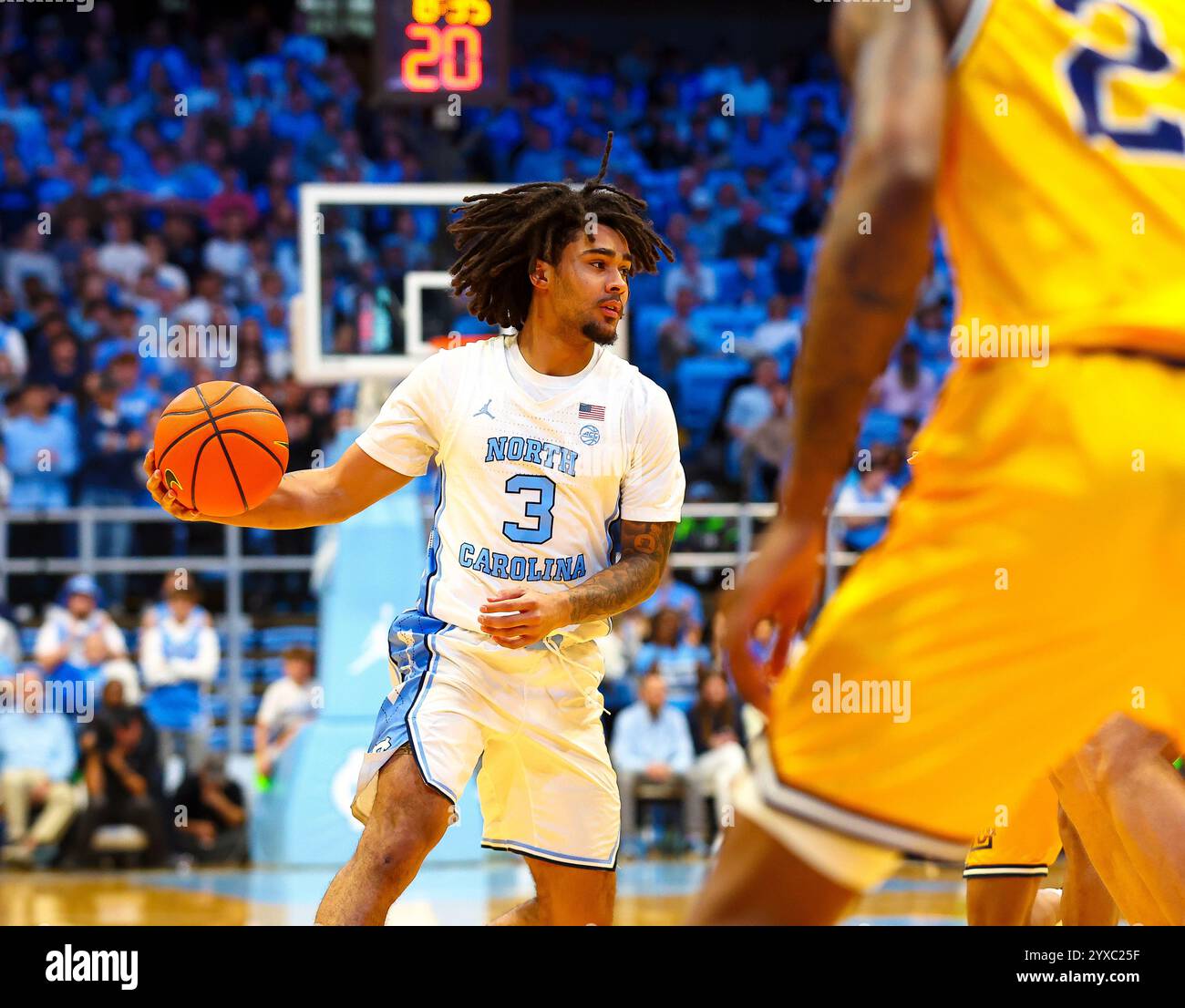 December 14, 2024: North Carolina sophomore Elliot Cadeau (3) dribbles ...