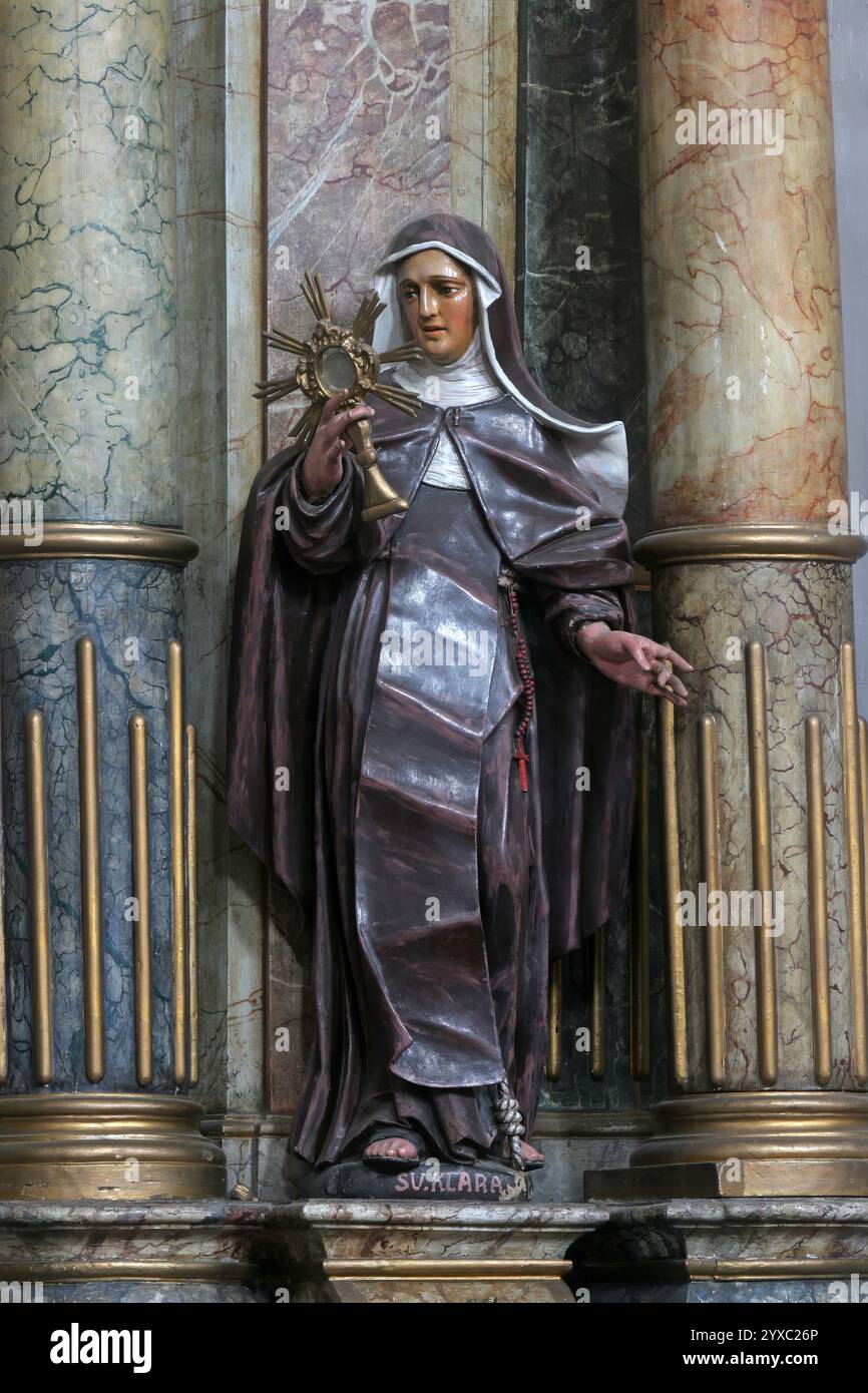 Saint Clare of Assisi, statue on the altar of Our Lady in the ...