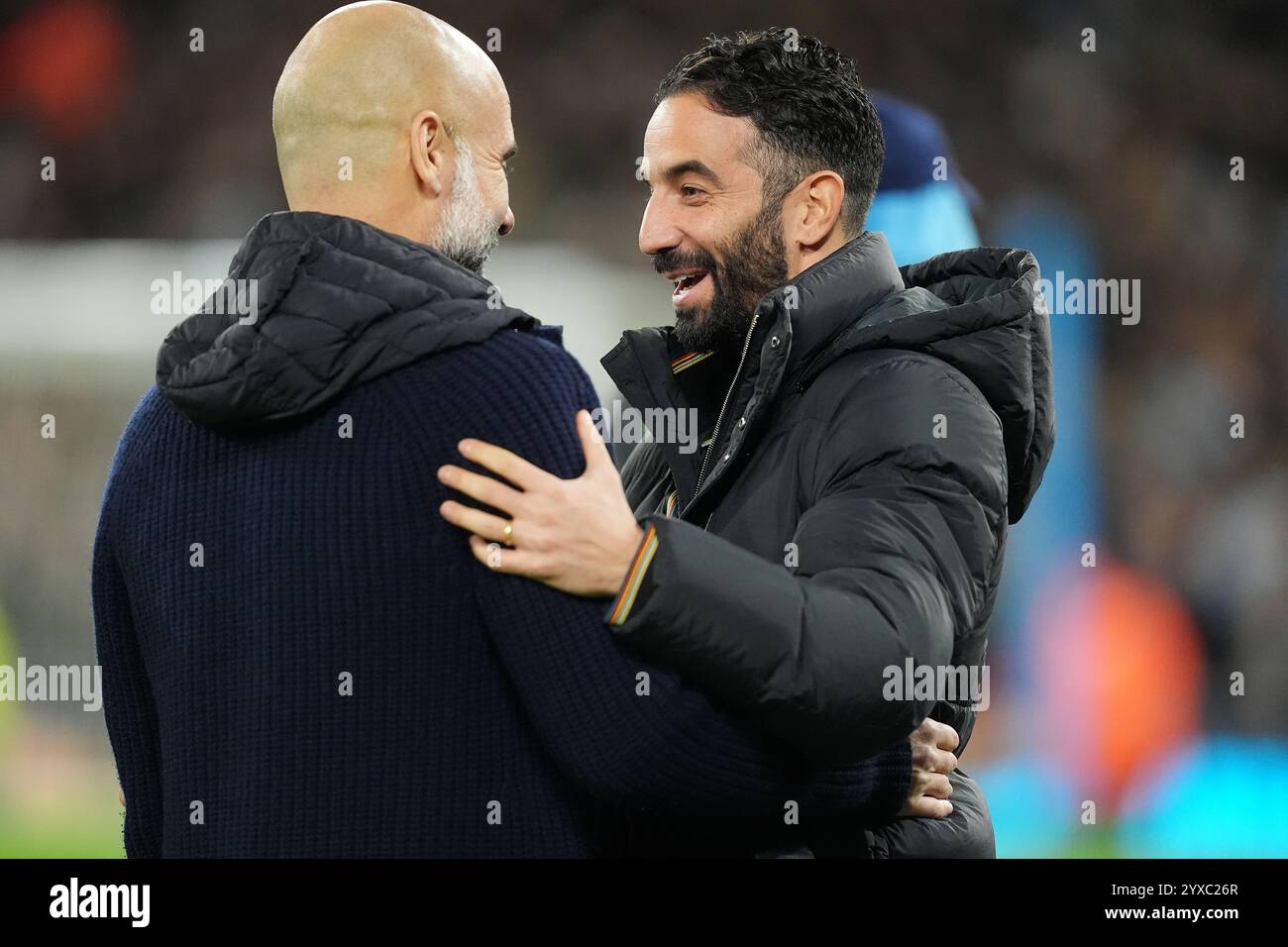 Manchester United manager Ruben Amorim (right) embraces Manchester City ...