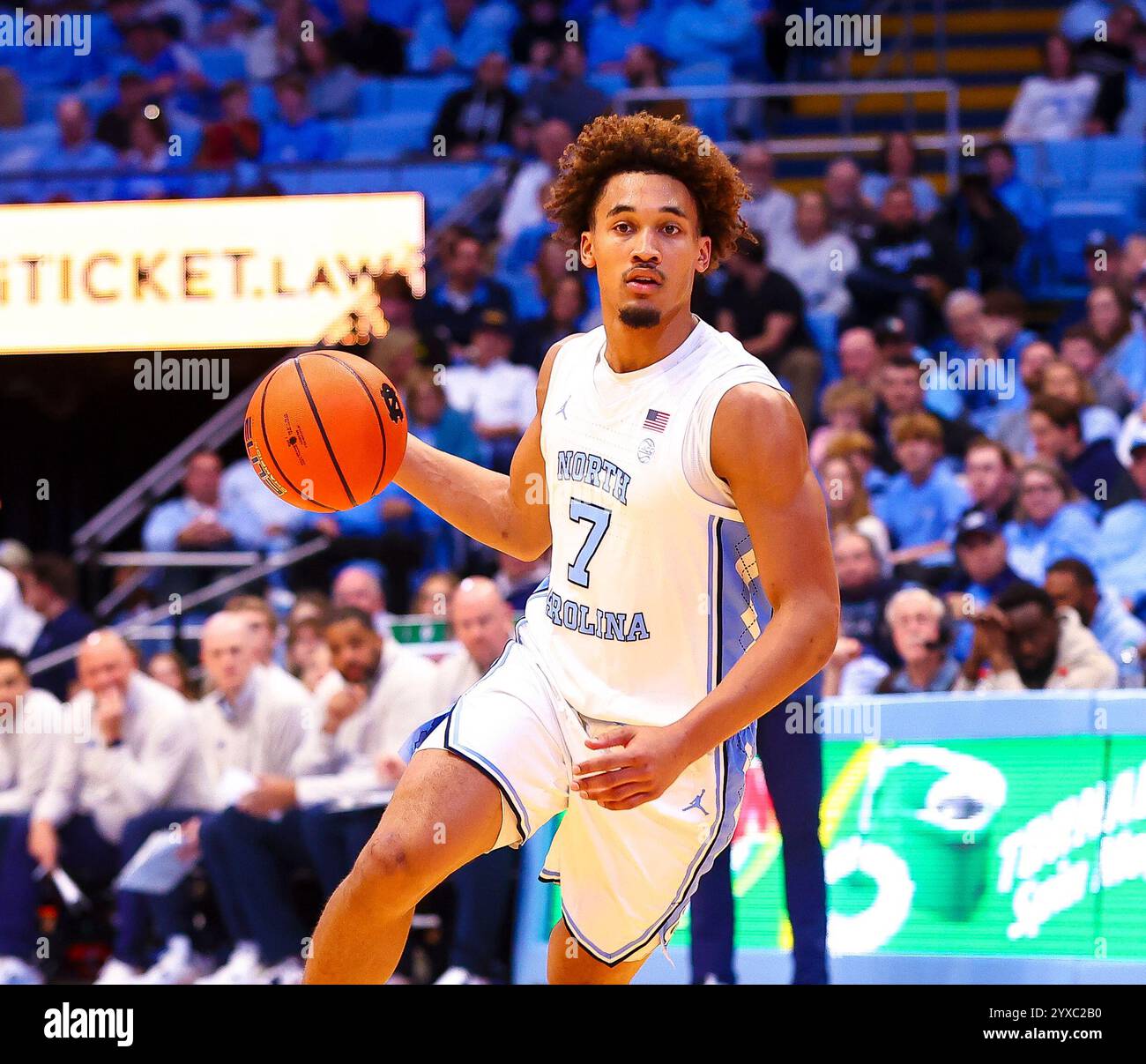 December 14, 2024: North Carolina junior Seth Trimble (7) dribbles the ...
