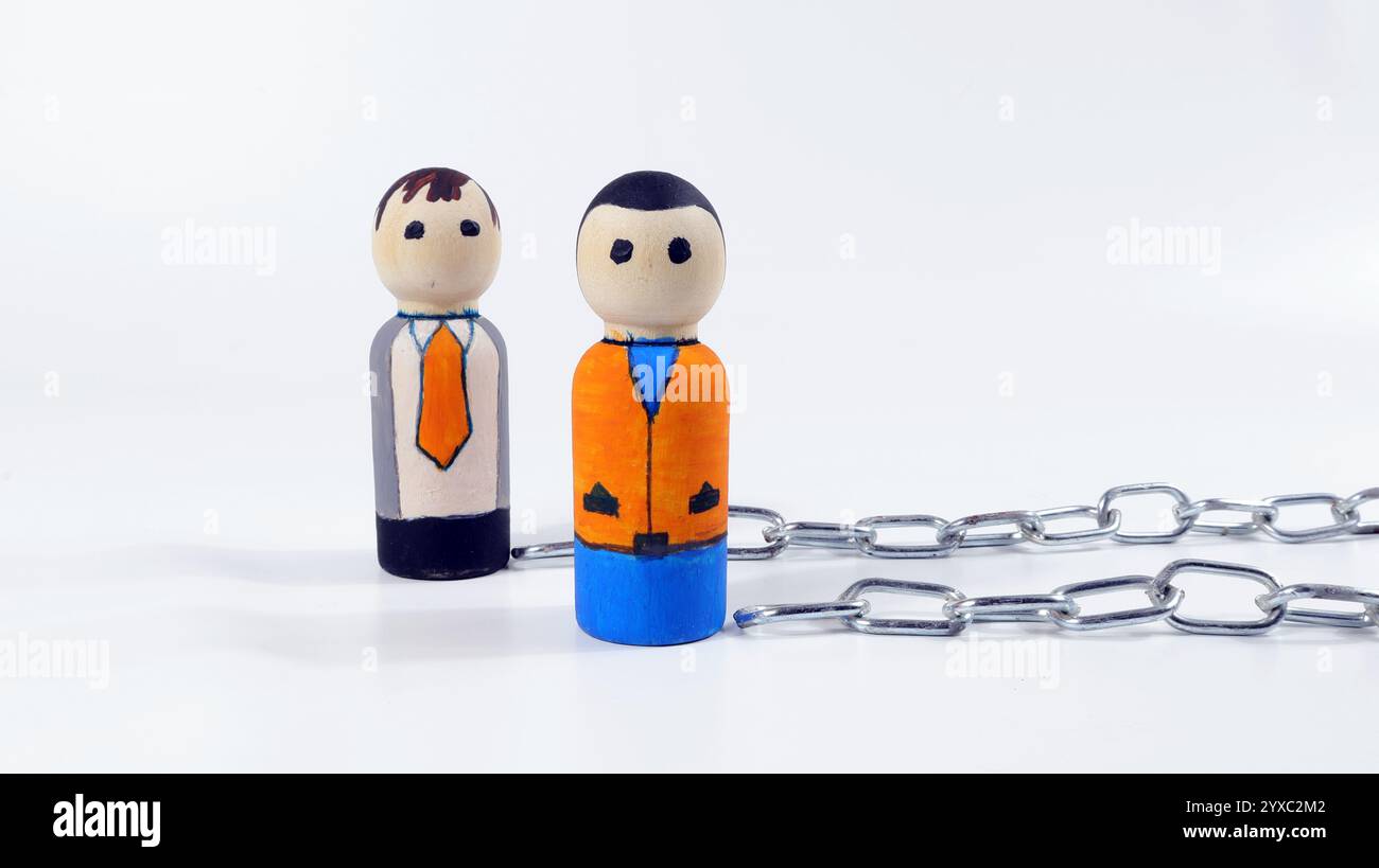 Two wooden mannequins tied by iron chain with the idea of sadness Stock ...