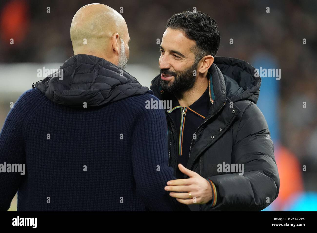 Manchester United manager Ruben Amorim (right) embraces Manchester City ...