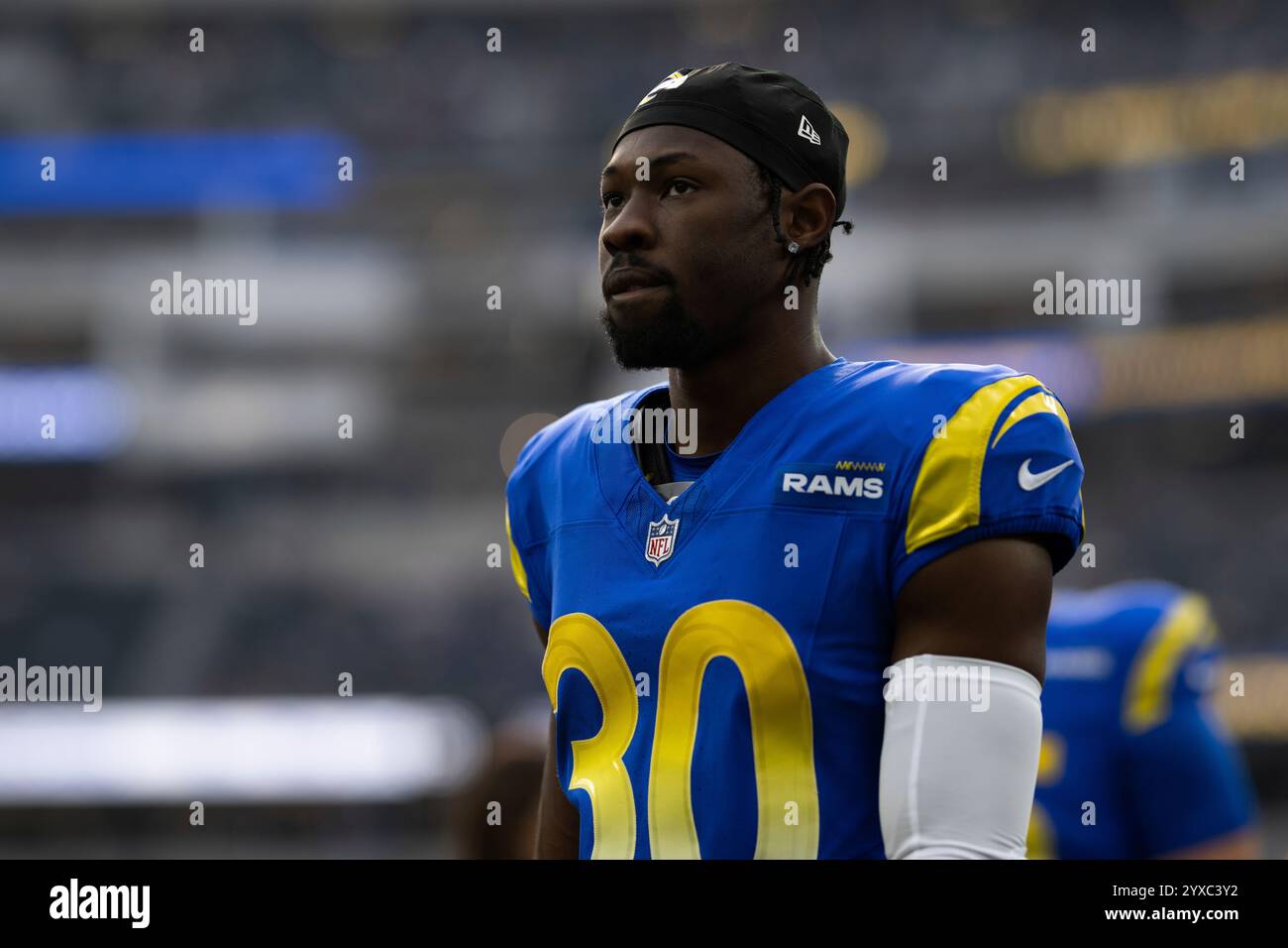 Los Angeles Rams cornerback Josh Wallace (30) walks back to the locker ...