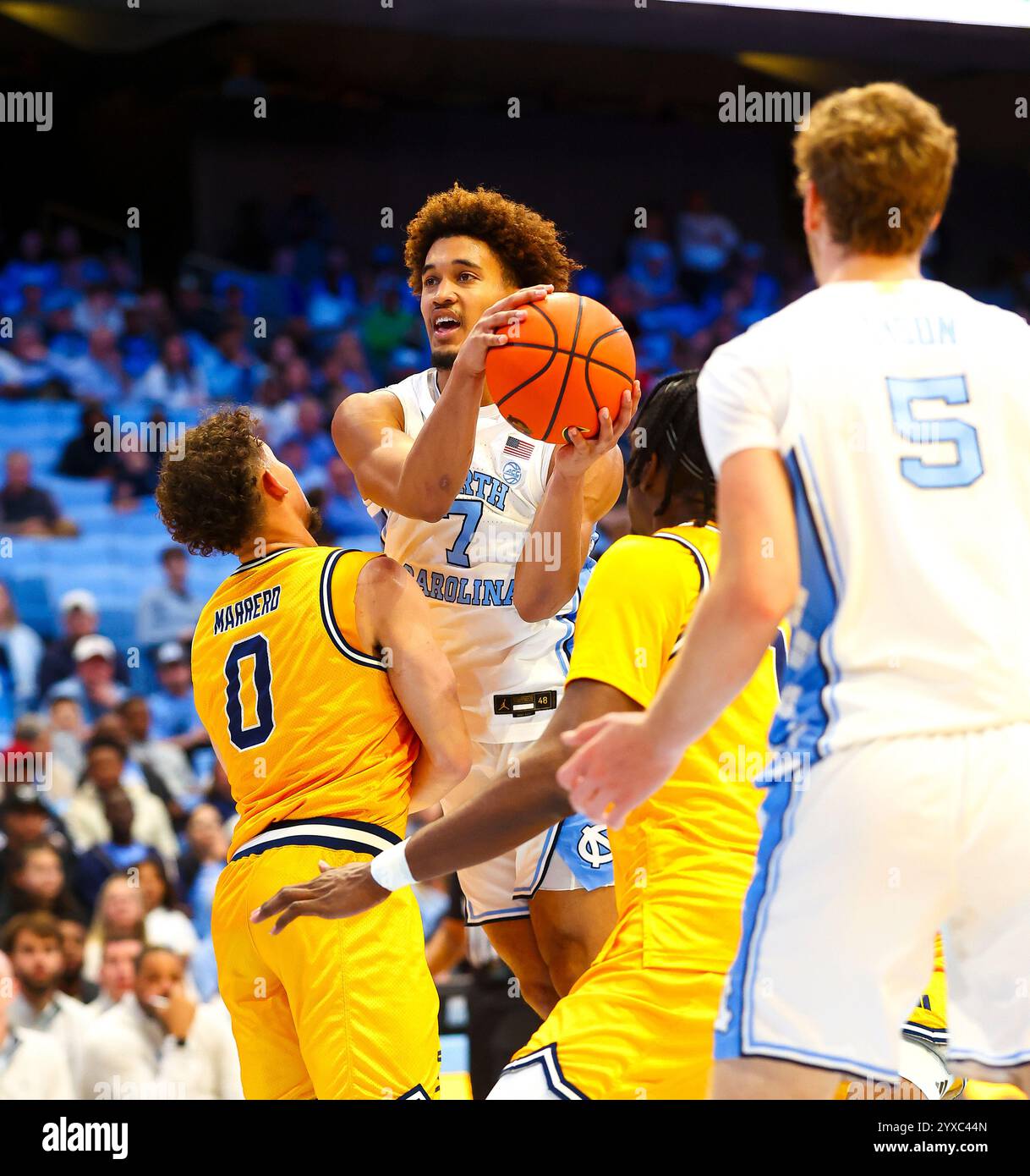 December 14, 2024: North Carolina junior Seth Trimble (7) goes up for ...