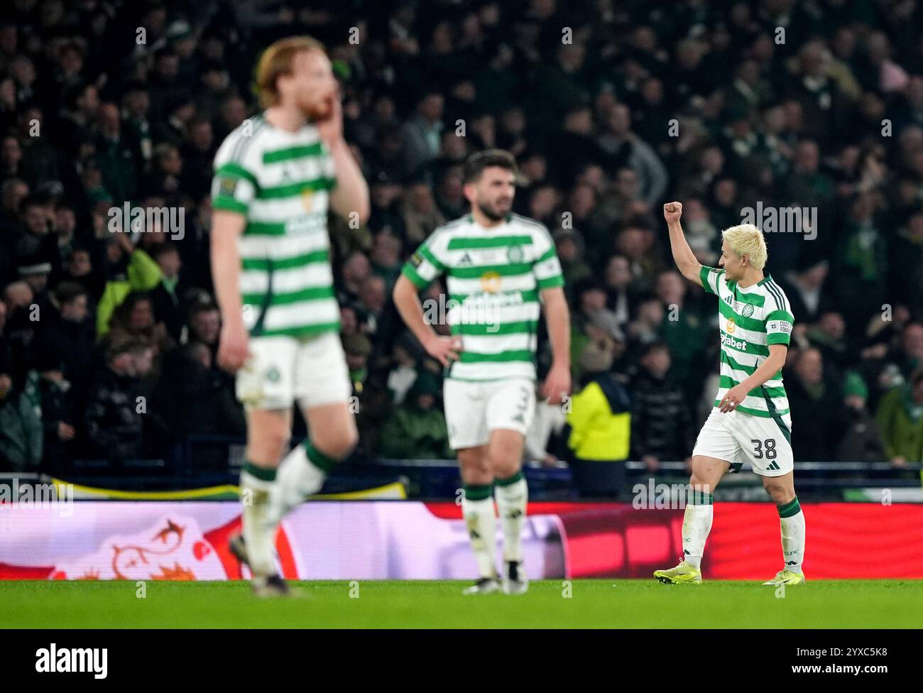 Celtic's Daizen Maeda (right) celebrates after scoring his sides second ...