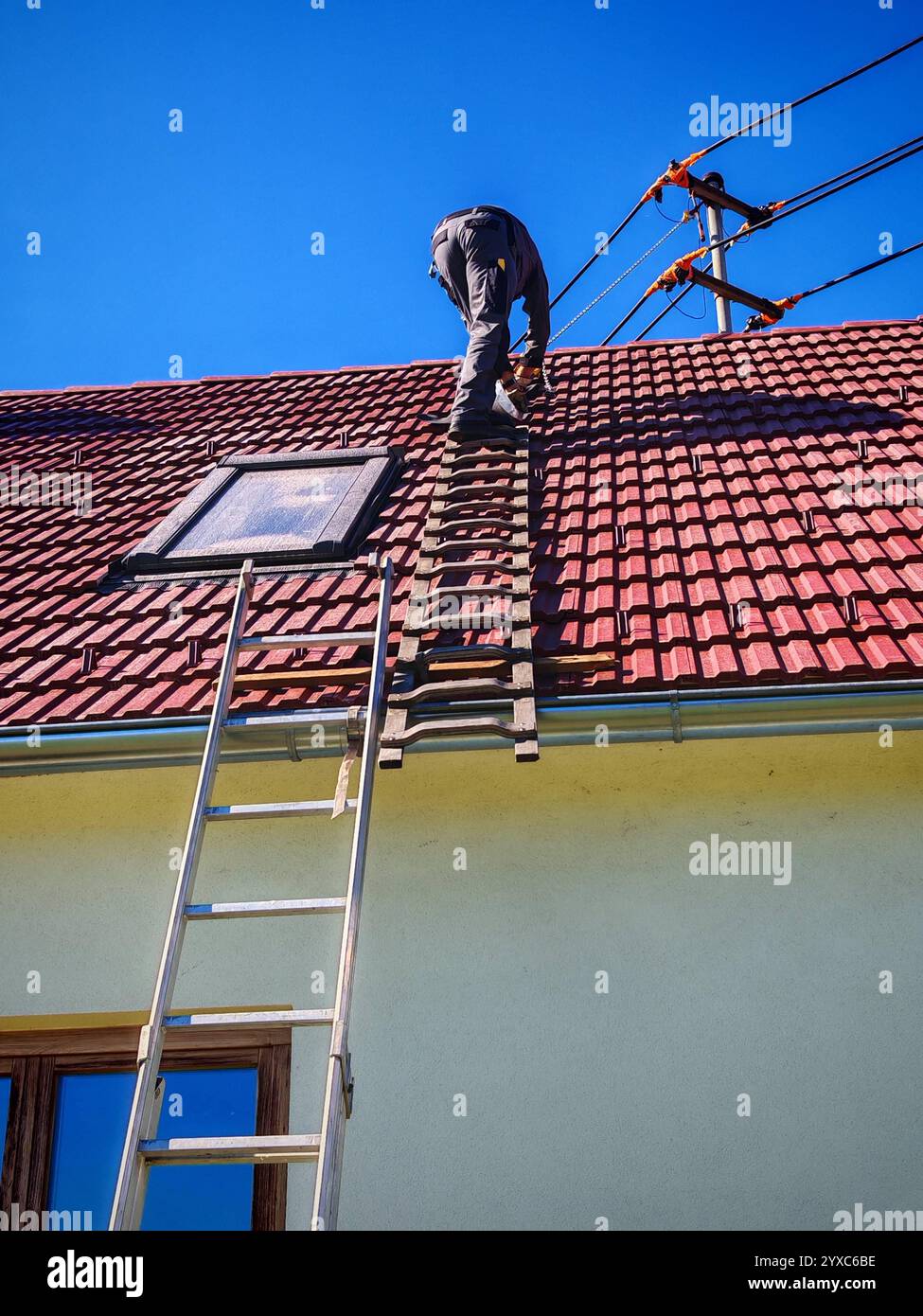 a ladder for climbing up when people working at height a ladder for ...