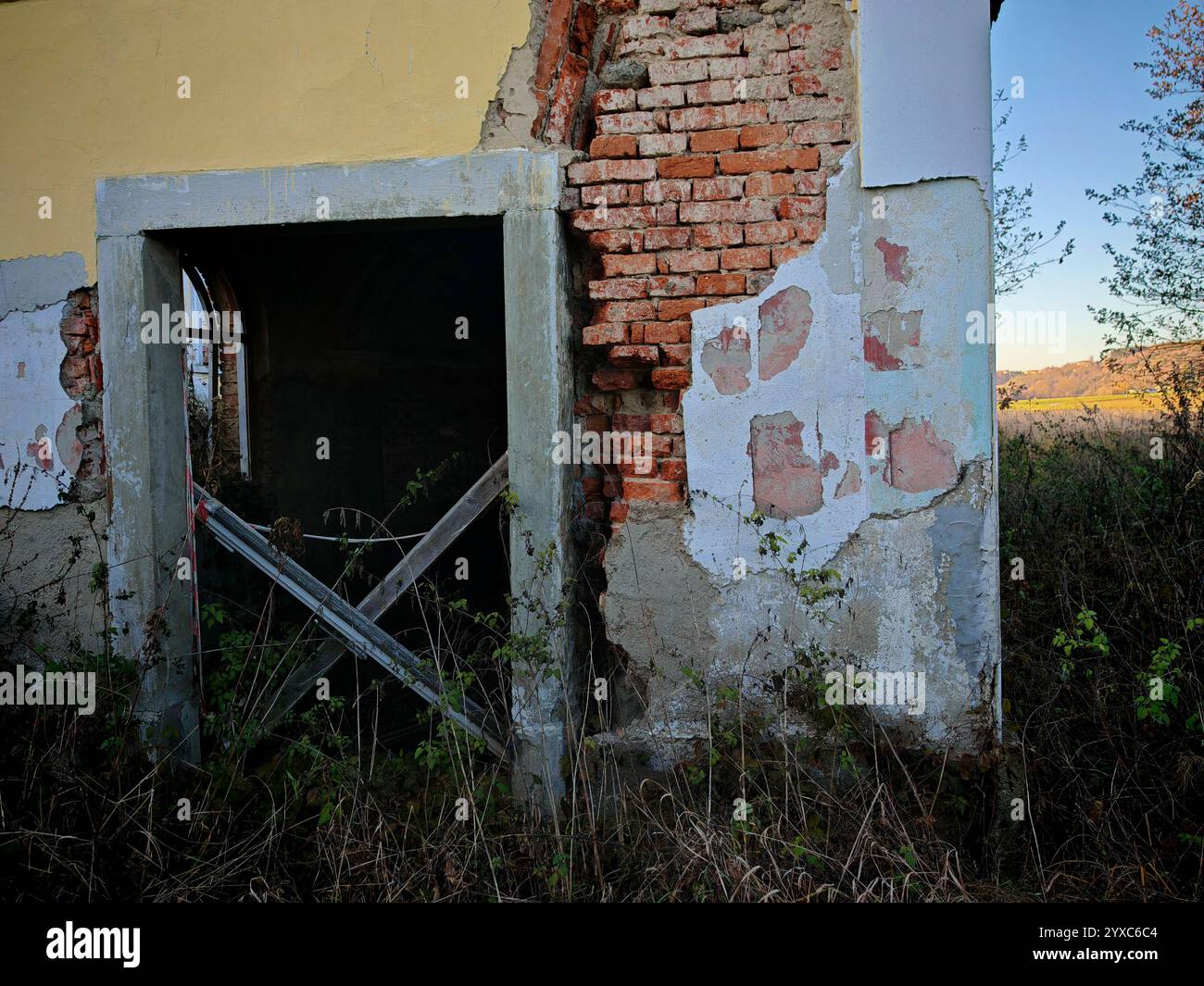decay and structural damage in building, abandoned house in rural area ...