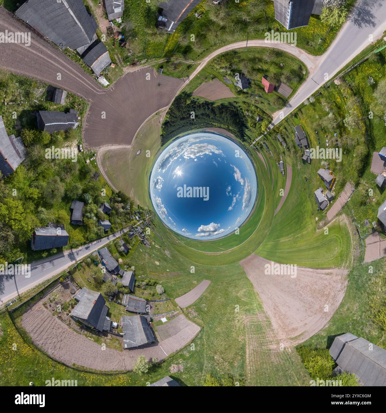 blue sphere inside overlooking old town, urban development, historic buildings and crossroads ...