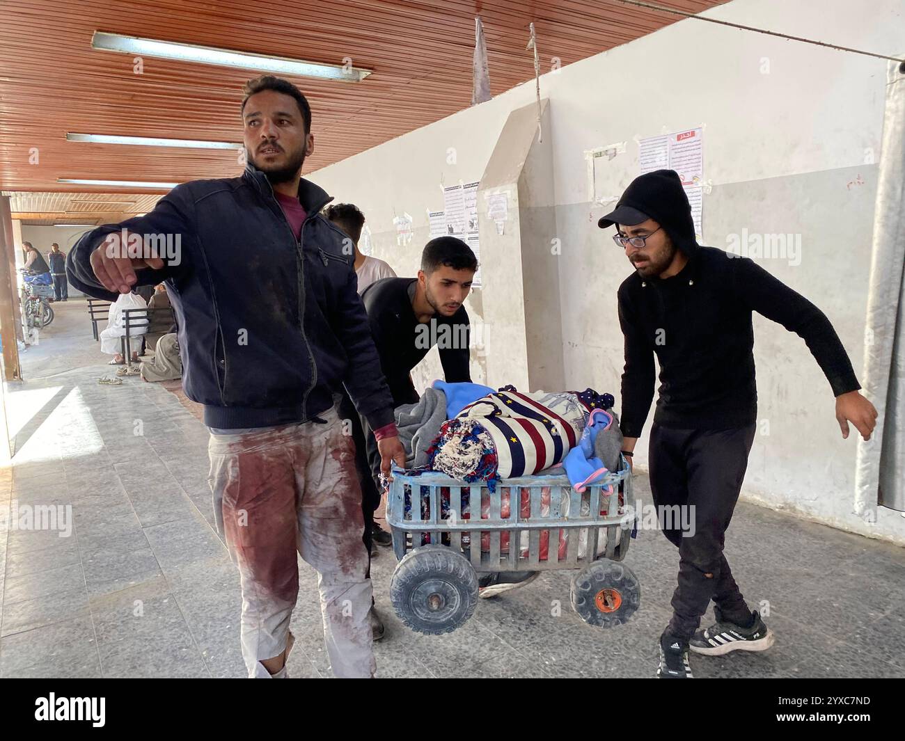 People transport the bodies and Injured of Palestinians includ children ...