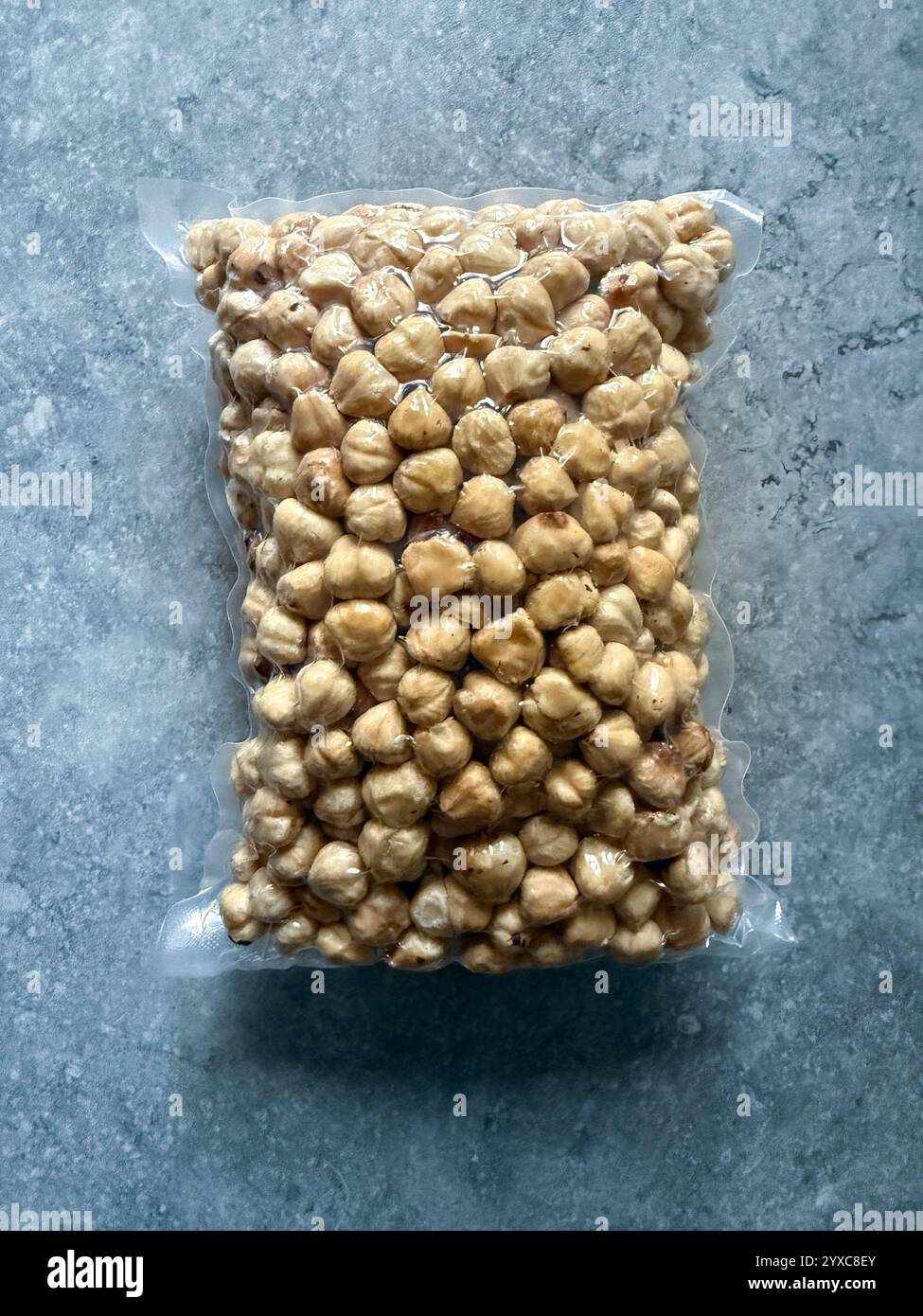 Vacuum hazelnut packed in transparent plastic bag. Ready to eat Stock ...