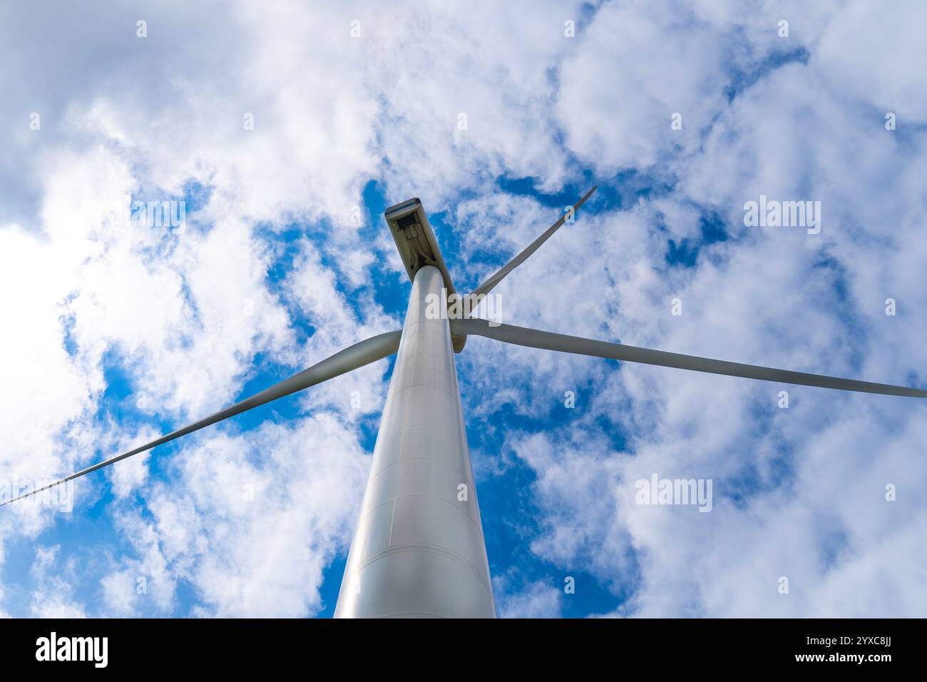 Wind turbine blue sky cloudy hi-res stock photography and images - Alamy