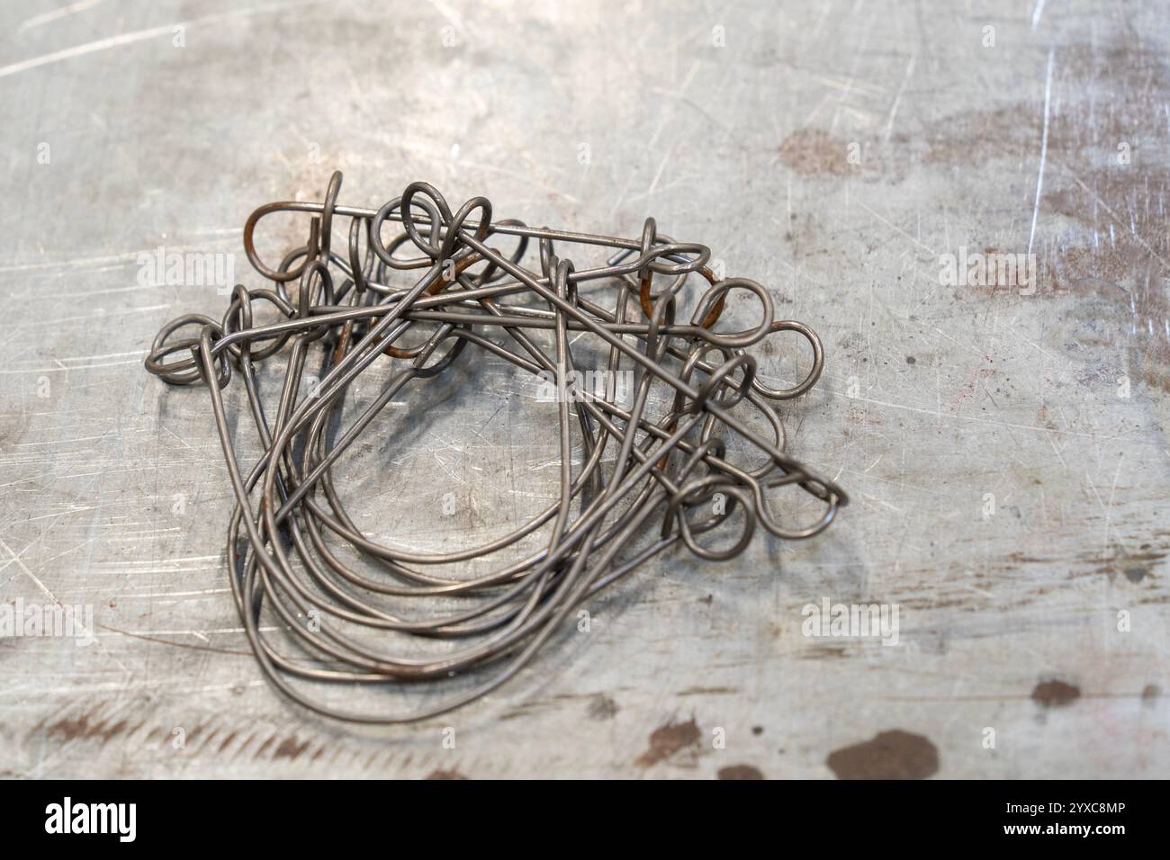 Tricky padlocks folded from wire Stock Photo - Alamy