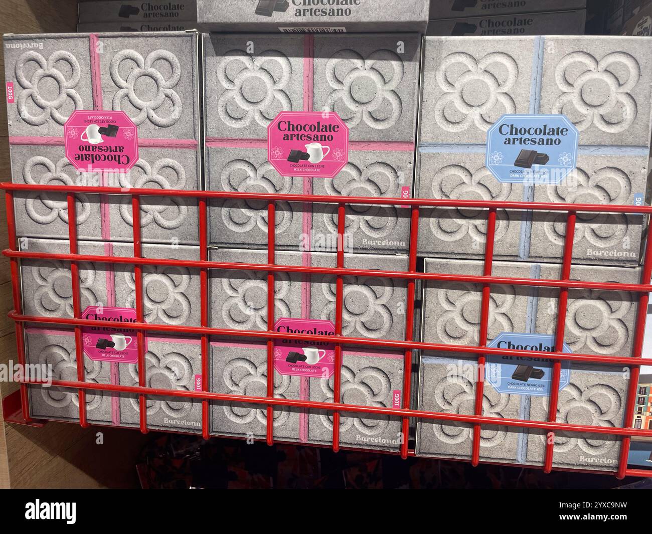 Boxes of "Chocolate Artesano" in gray packaging with floral tile ...