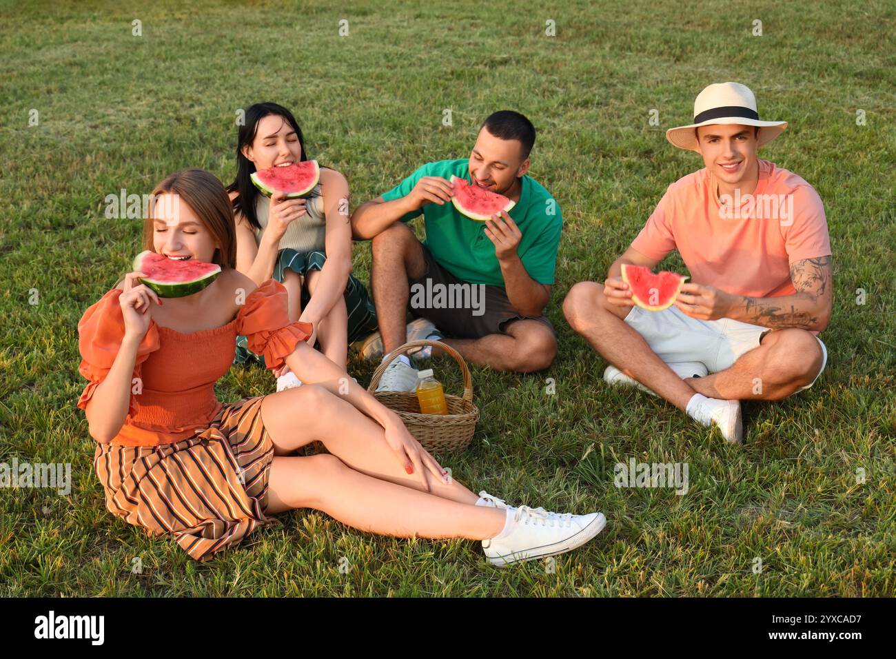 Group people eating watermelon hi-res stock photography and images - Alamy
