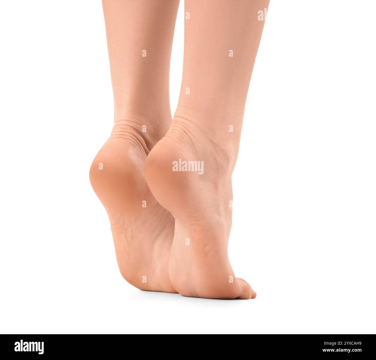 Young woman with flat feet isolated on white background, back view ...