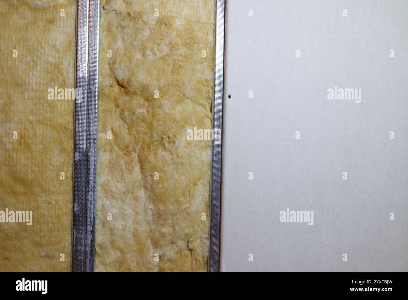 a new drywall with insulation and metal studs Stock Photo - Alamy