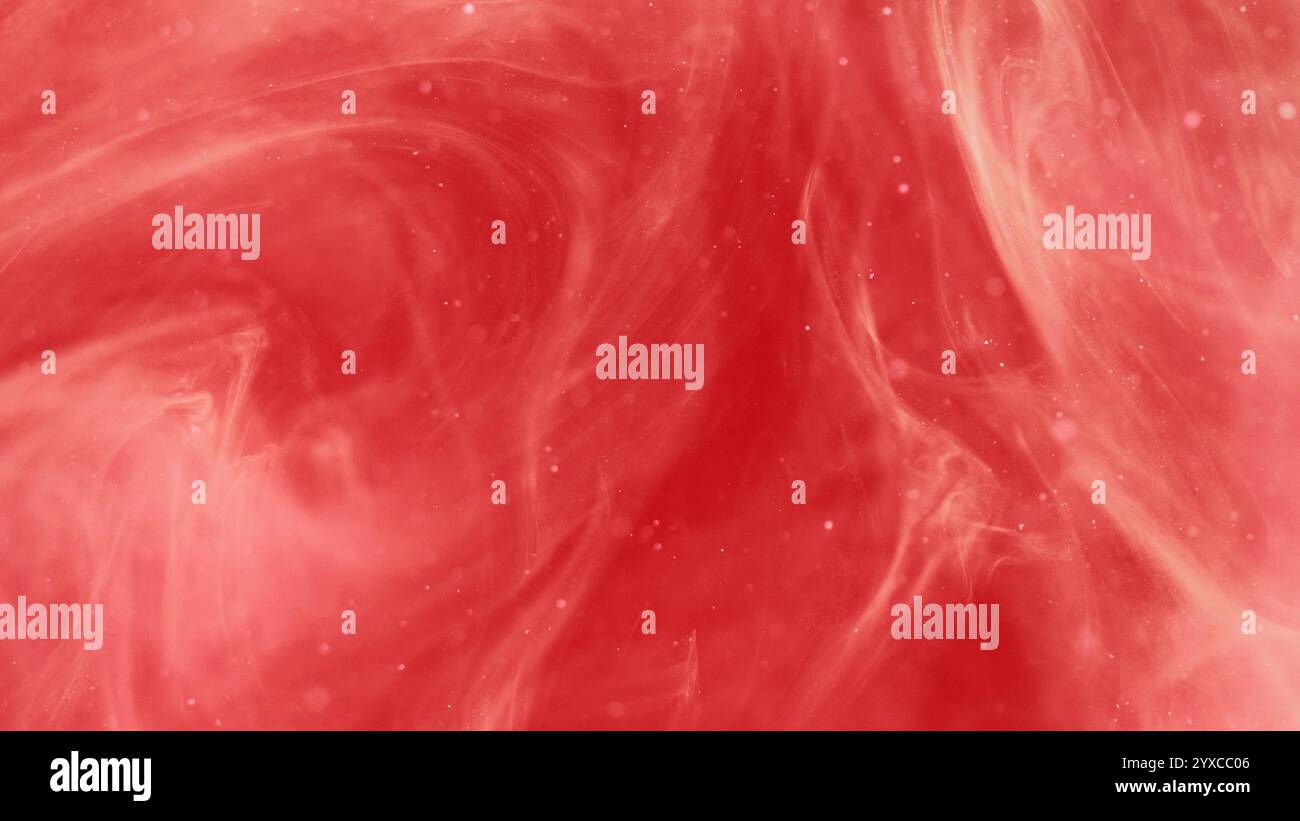 Paint water flow. Color mix. Defocused red white shimmering glitter ...