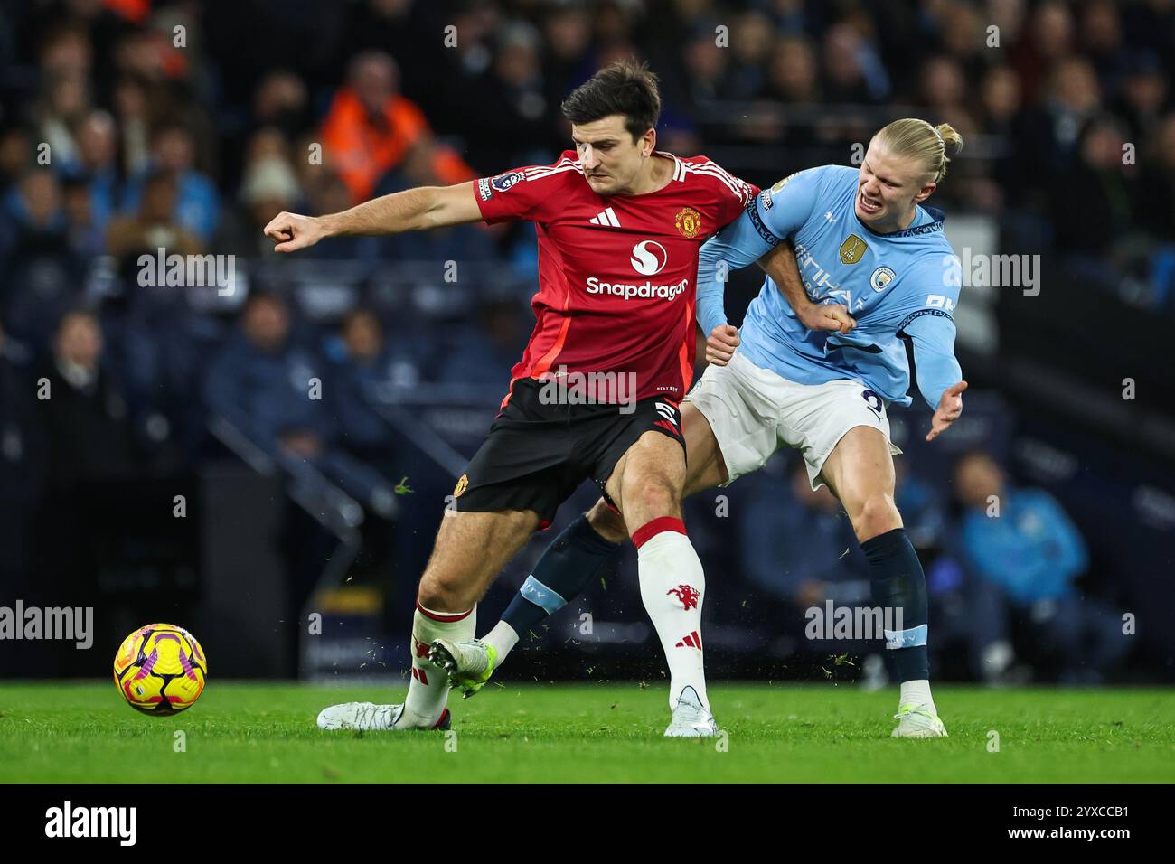 Harry Maguire of Manchester United and Erling Haaland of Manchester ...