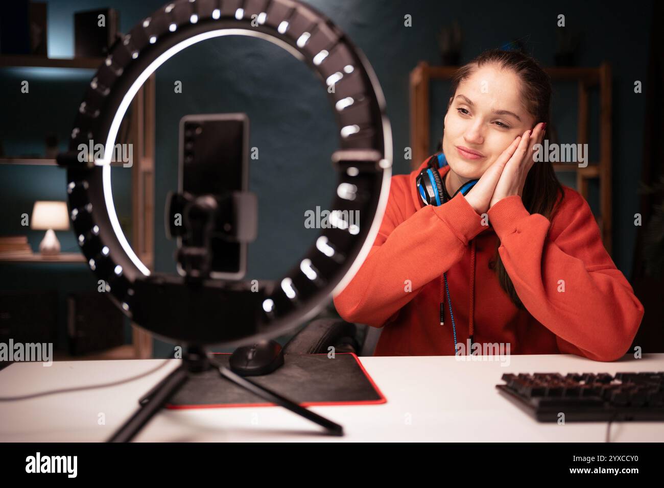 Woman gamer blogger influencer streaming live with her subscribers ...