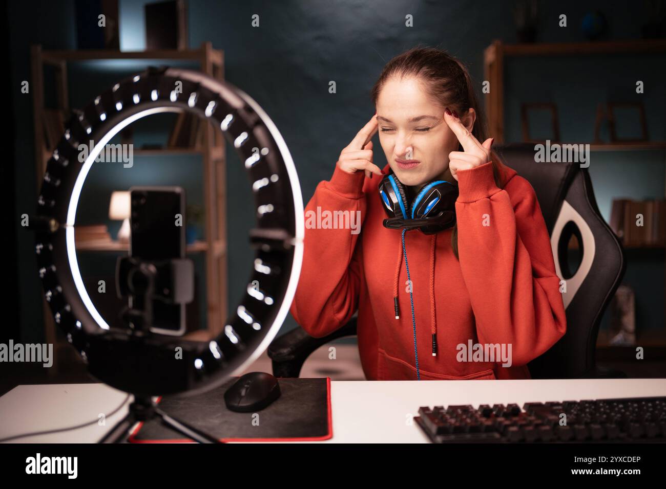 Woman gamer blogger influencer streaming live with her subscribers ...