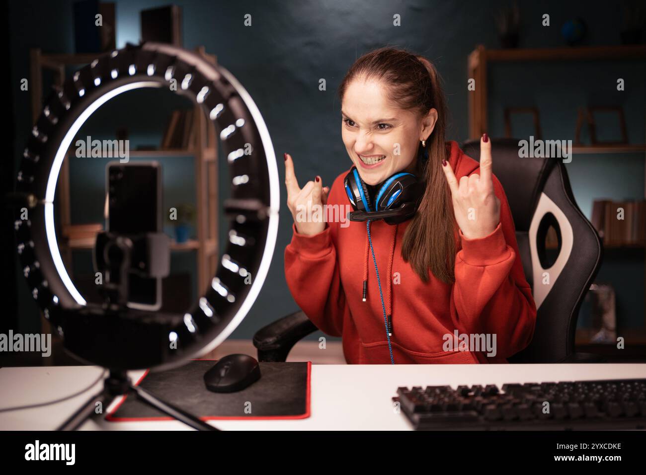 Woman gamer blogger influencer streaming live with her subscribers ...