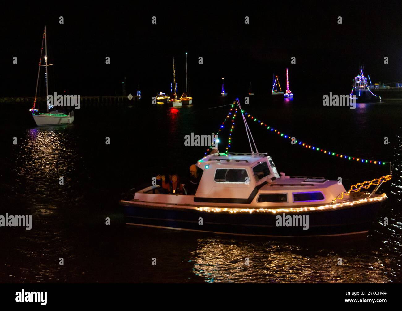 Poole, Dorset, UK. 15th December 2024 Crowds gather to watch the ...