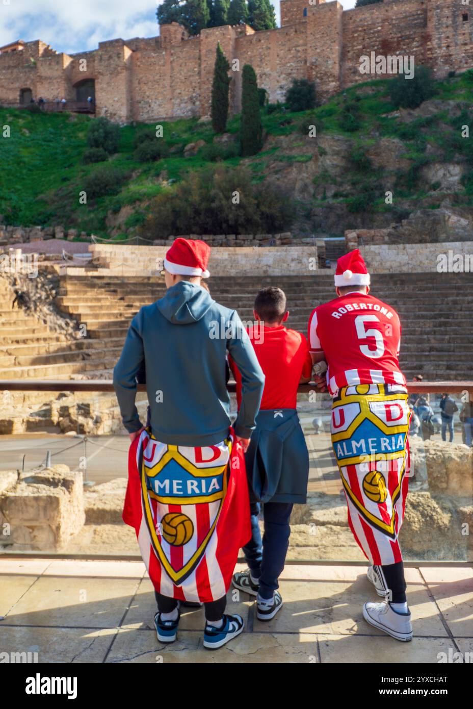 12/07/2024. Malaga, Spain. Group of fans wearing jerseys of their ...