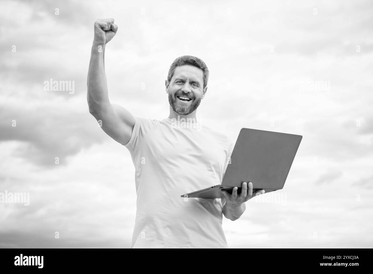 Happy freelancer working on Black and White Stock Photos & Images - Alamy