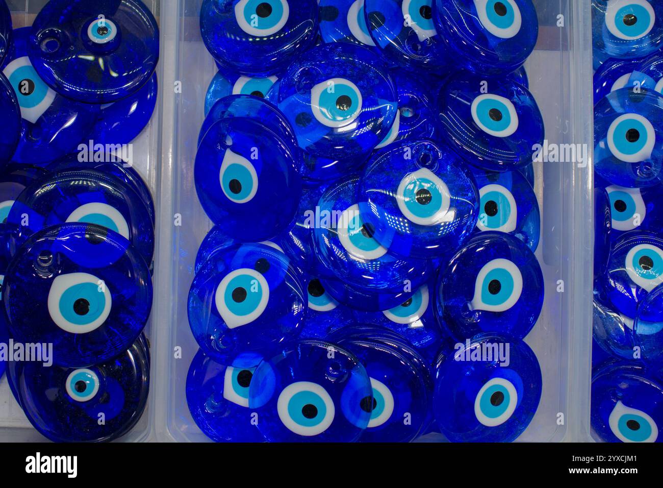 Souvenir for tourists. Pile of turkish evil eye nazar (amulet). Made of ...