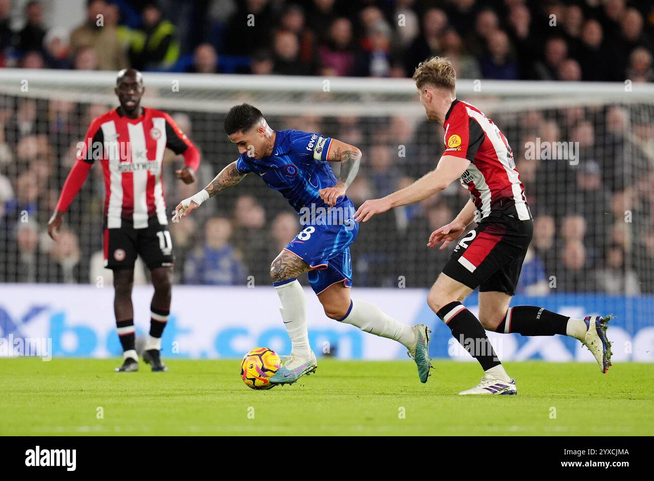 Chelsea's Enzo Fernandez (centre) and Brentford's Nathan Collins (right ...