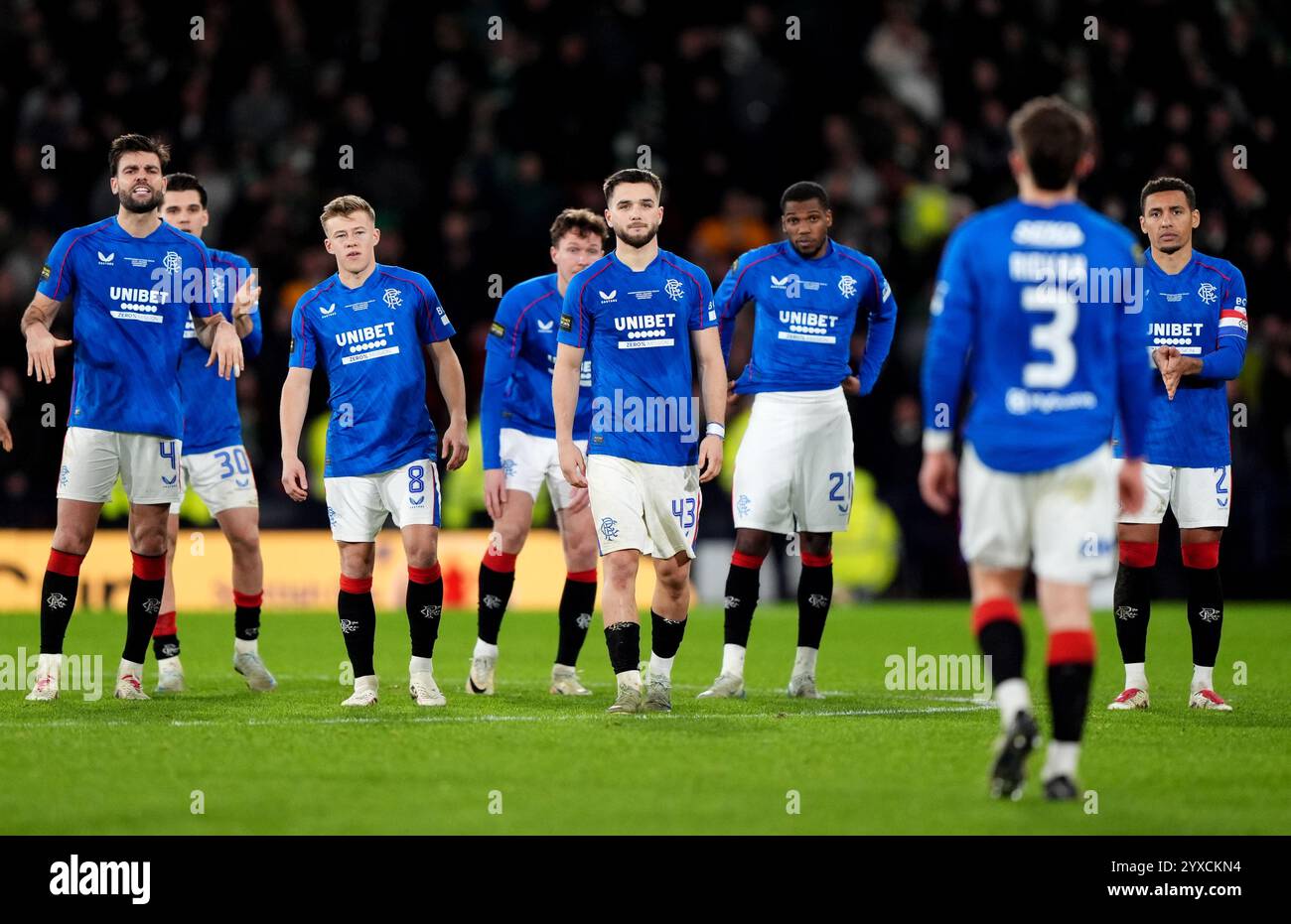 Rangers' Ridvan Yilmaz walks back to his team mates in the centre ...