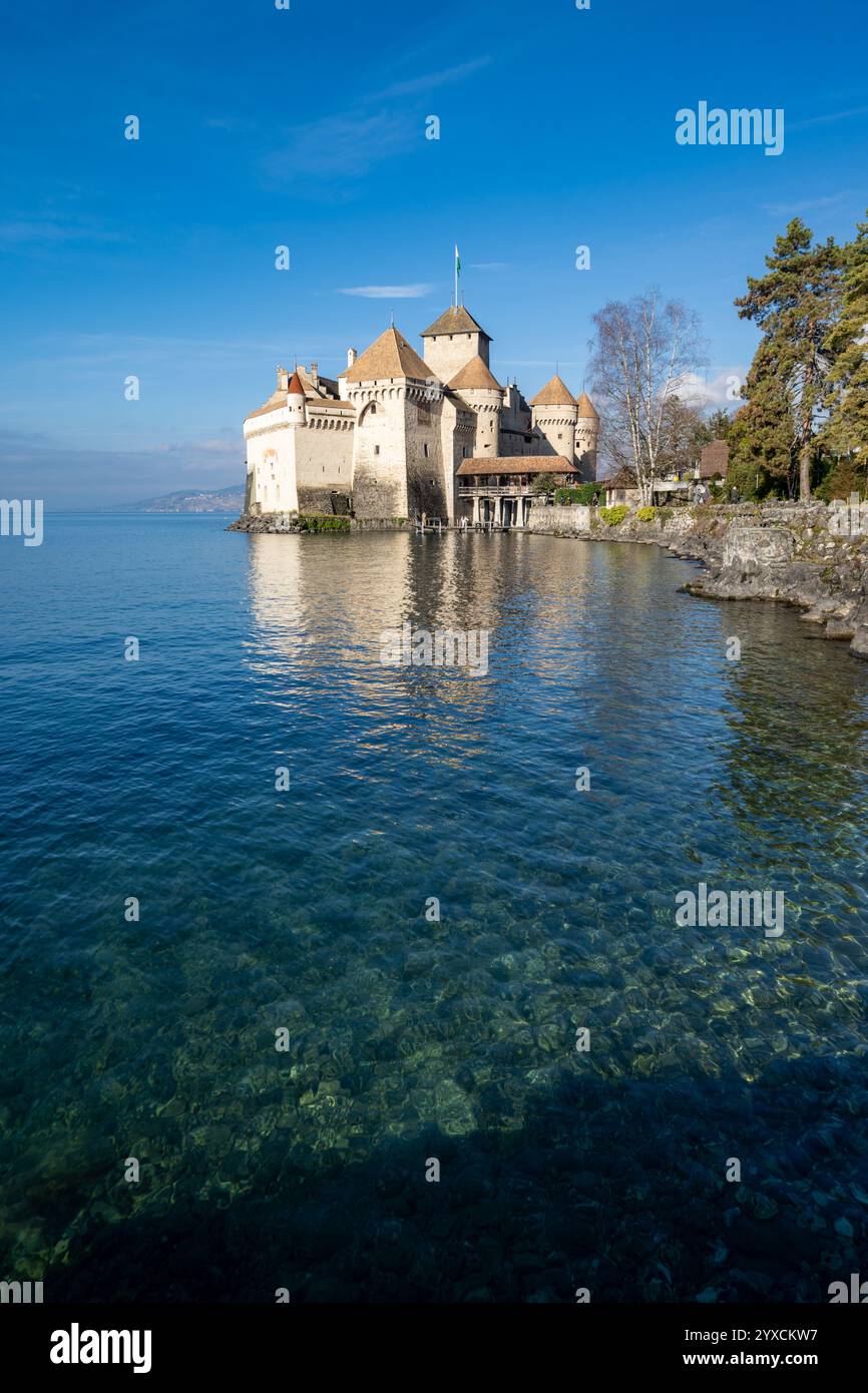 Chillon Castle or Chateau de Chillon is a famous castle located on Lake ...