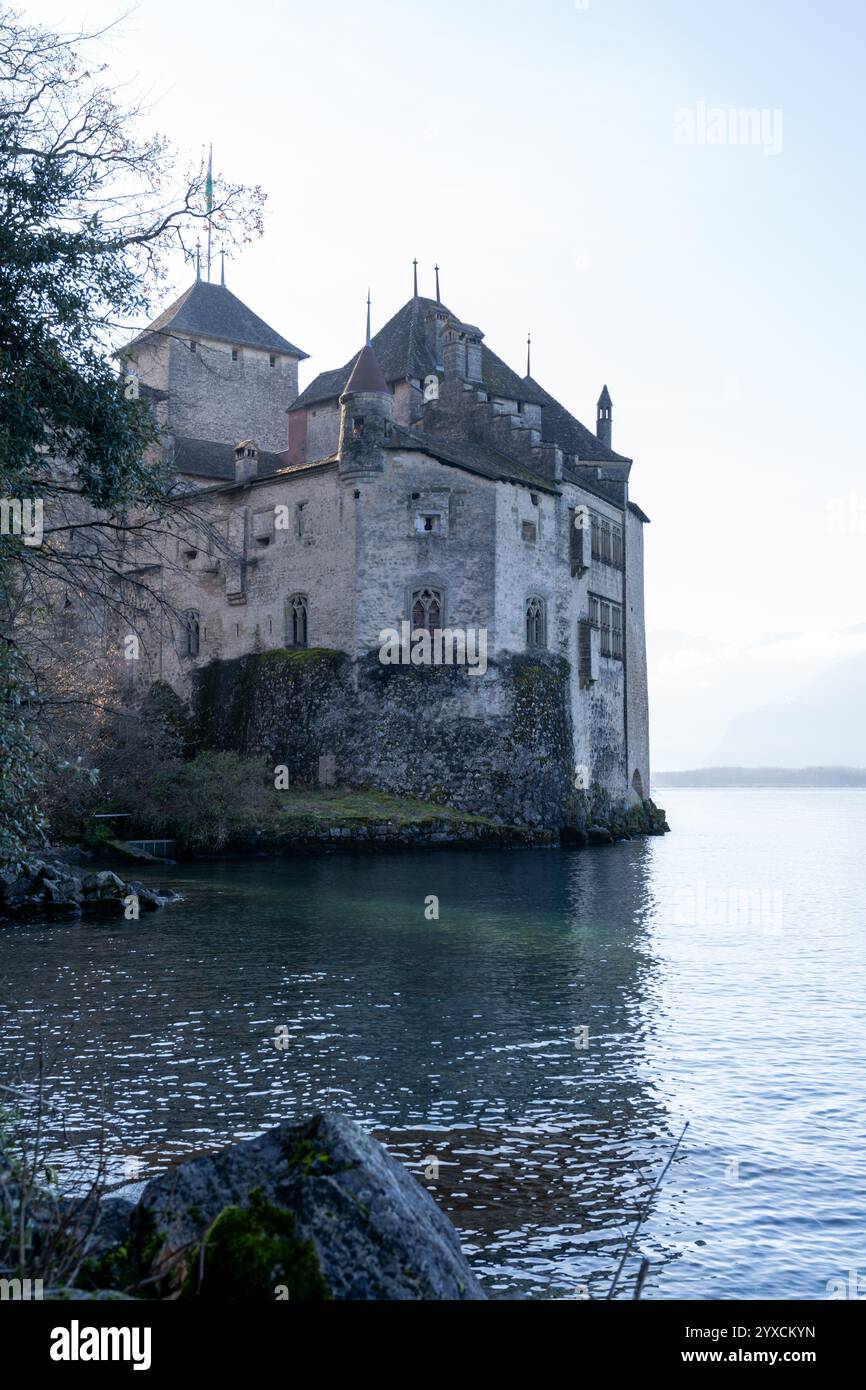 Chillon Castle or Chateau de Chillon is a famous castle located on Lake ...