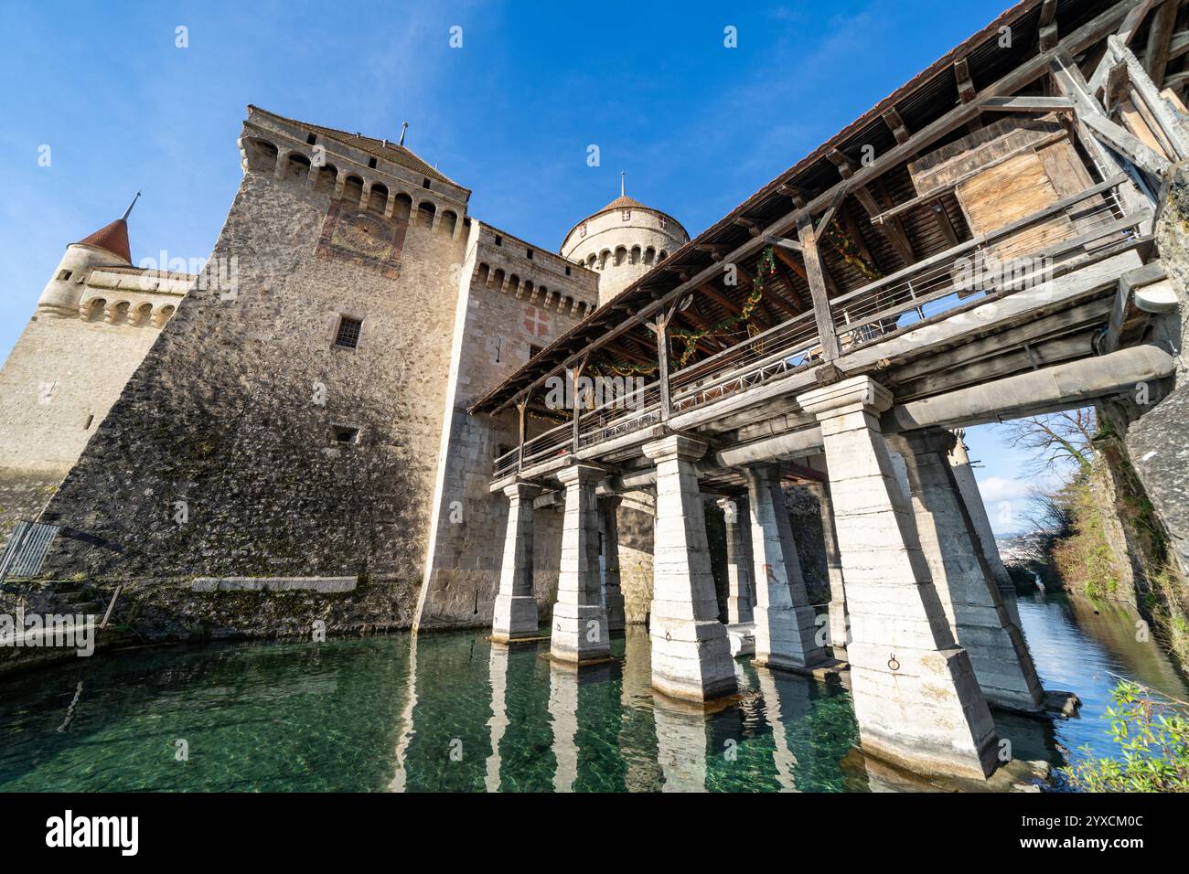 Chillon Castle or Chateau de Chillon is a famous castle located on Lake ...