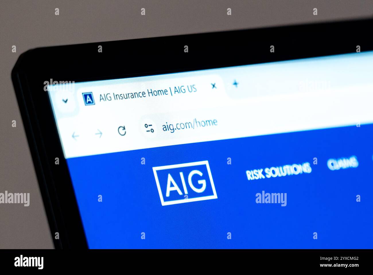 New York, USA - December 15, 2024: AIG official website homepage displayed on computer screen ...