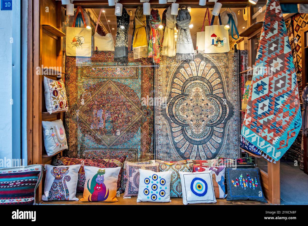 Intricately designed textiles, rugs and cushions showcase vibrant ...