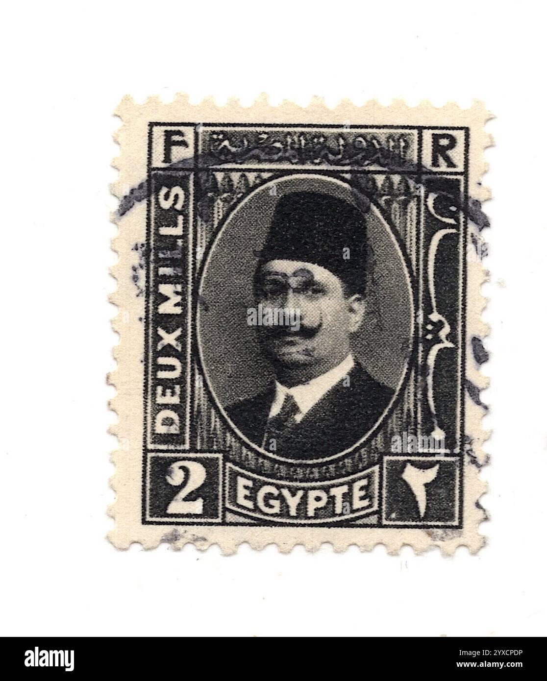 A vintage King Fouad postage stamp from Egypt isolated on a white ...