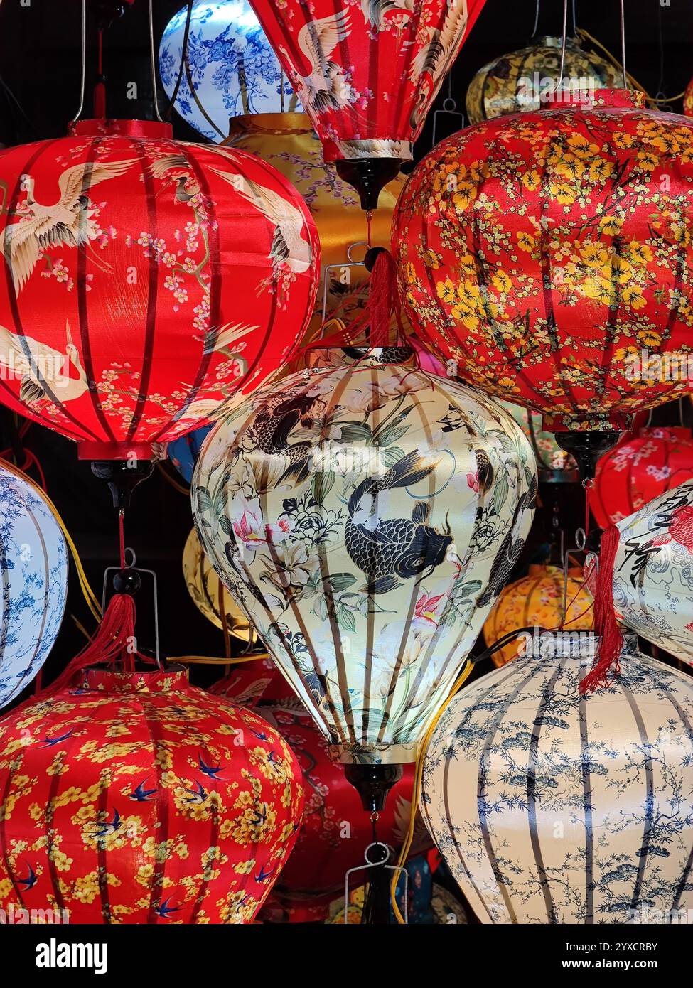 Traditional Vietnamese paper lanterns lighted in Hoi An ancient town ...
