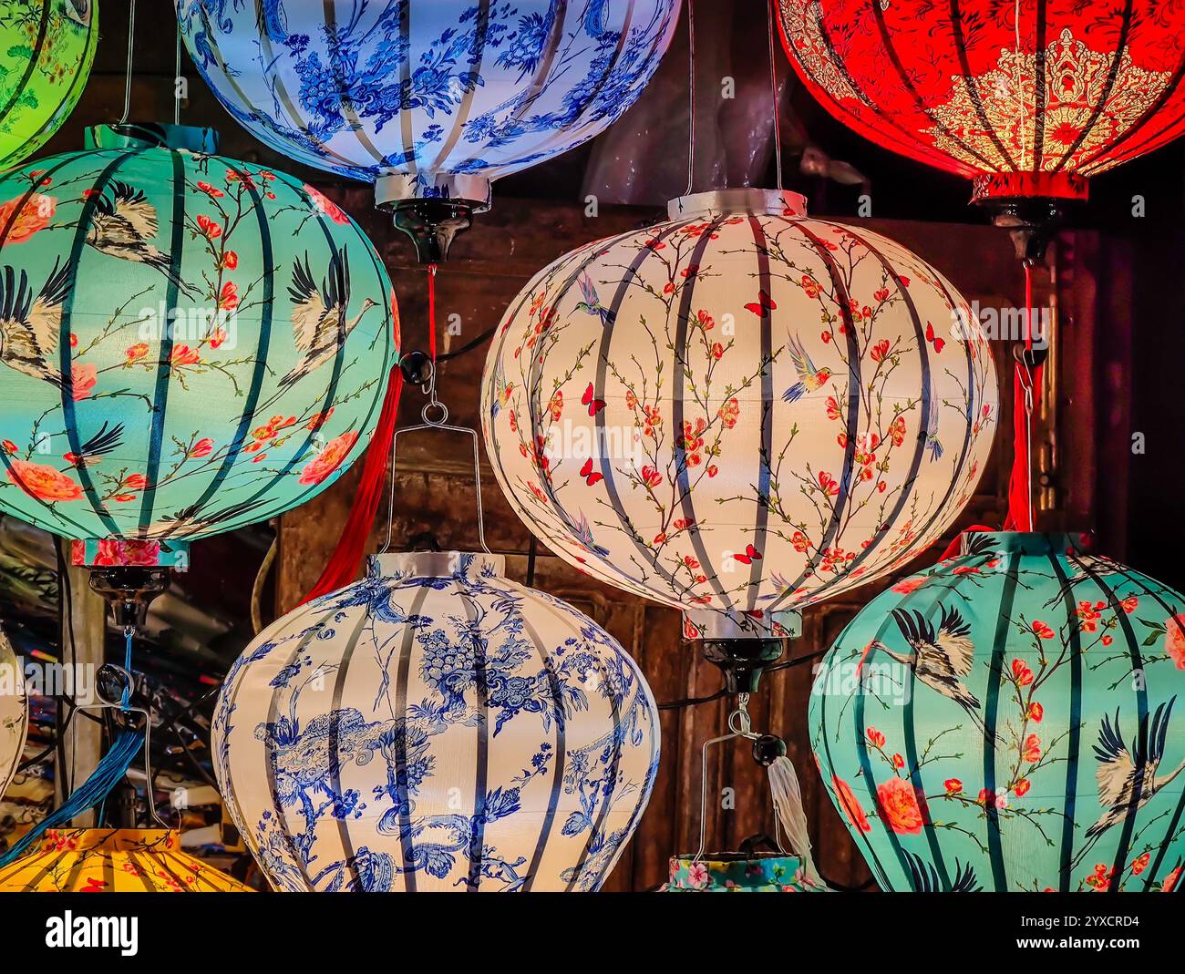 Traditional Vietnamese paper lanterns lighted in Hoi An ancient town ...