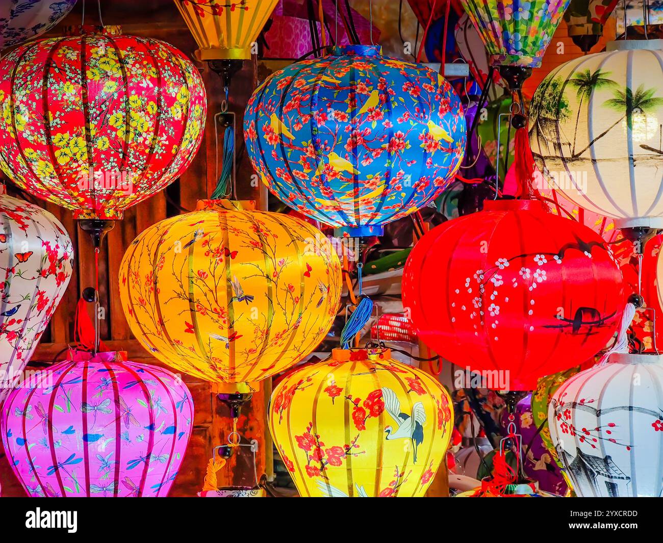 Traditional Vietnamese paper lanterns lighted in Hoi An ancient town ...