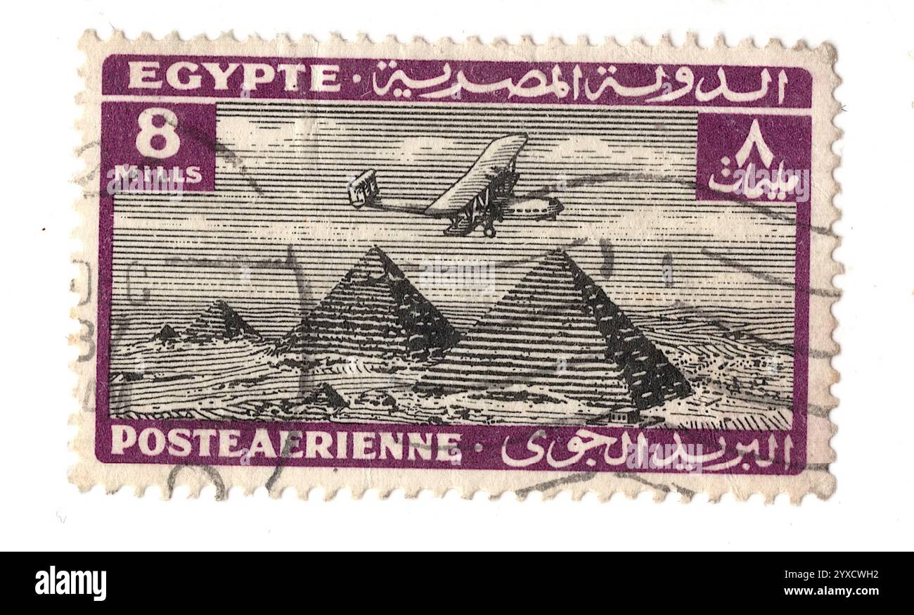 A vintage Air Mail postage stamp from Egypt isolated on a white ...