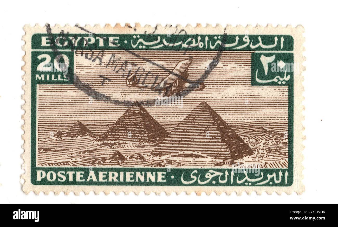 A vintage Air Mail postage stamp from Egypt isolated on a white ...